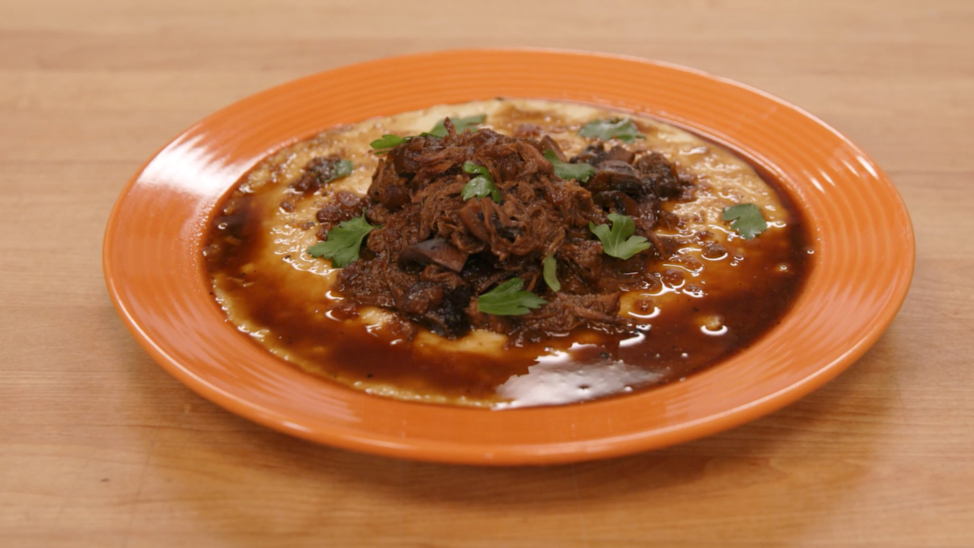 Braised Beef With Mushrooms Over Creamy Polenta | Tastemade