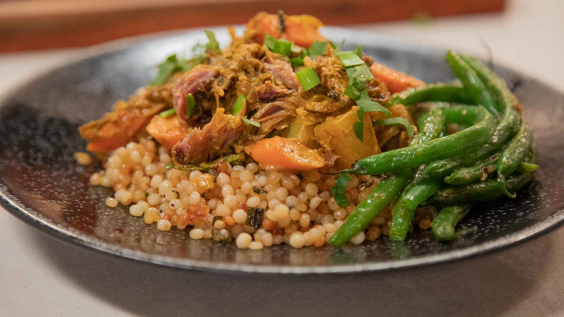 Quick Curry Lamb w/ Crispy CousCous and Haricot Vert | Tastemade